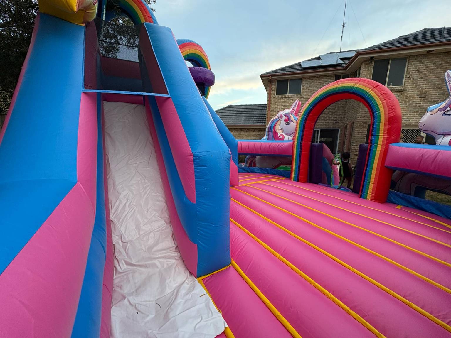 Unicorn Jumping Castle Hire and Slide | Wonderland Jumping Castles